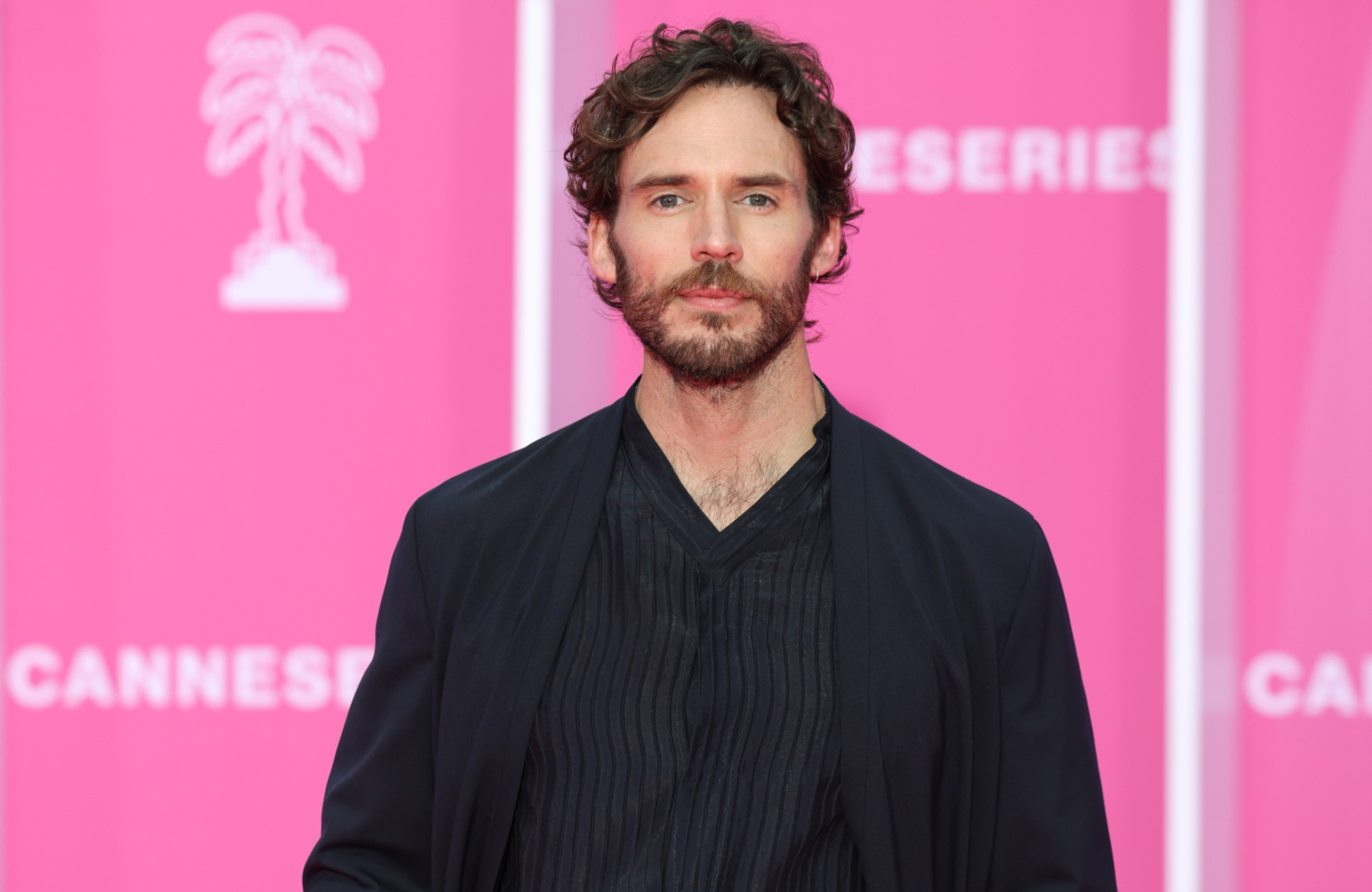 Sam Claflin Mourns His Late 'Hunger Games' Co-Star - PopCulture.com