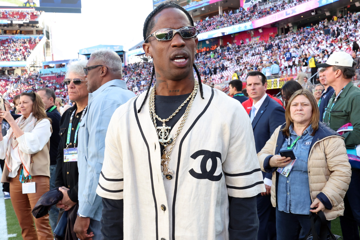 Travis Scott Breaks Sign During Super Bowl Concert - PopCulture.com